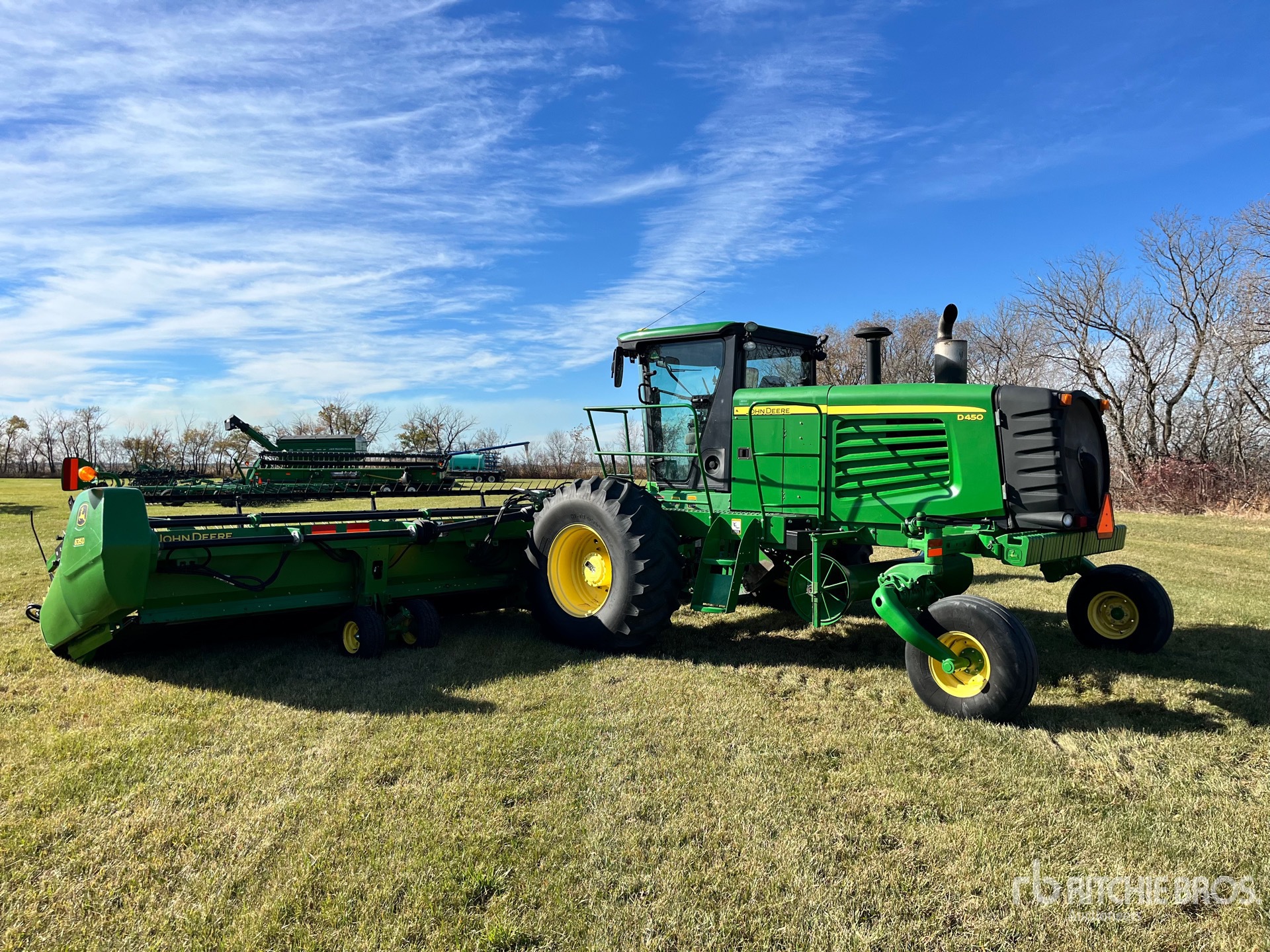 2012 John Deere D450 35 ft Swather Windrower | Ritchie Bros. Auctioneers