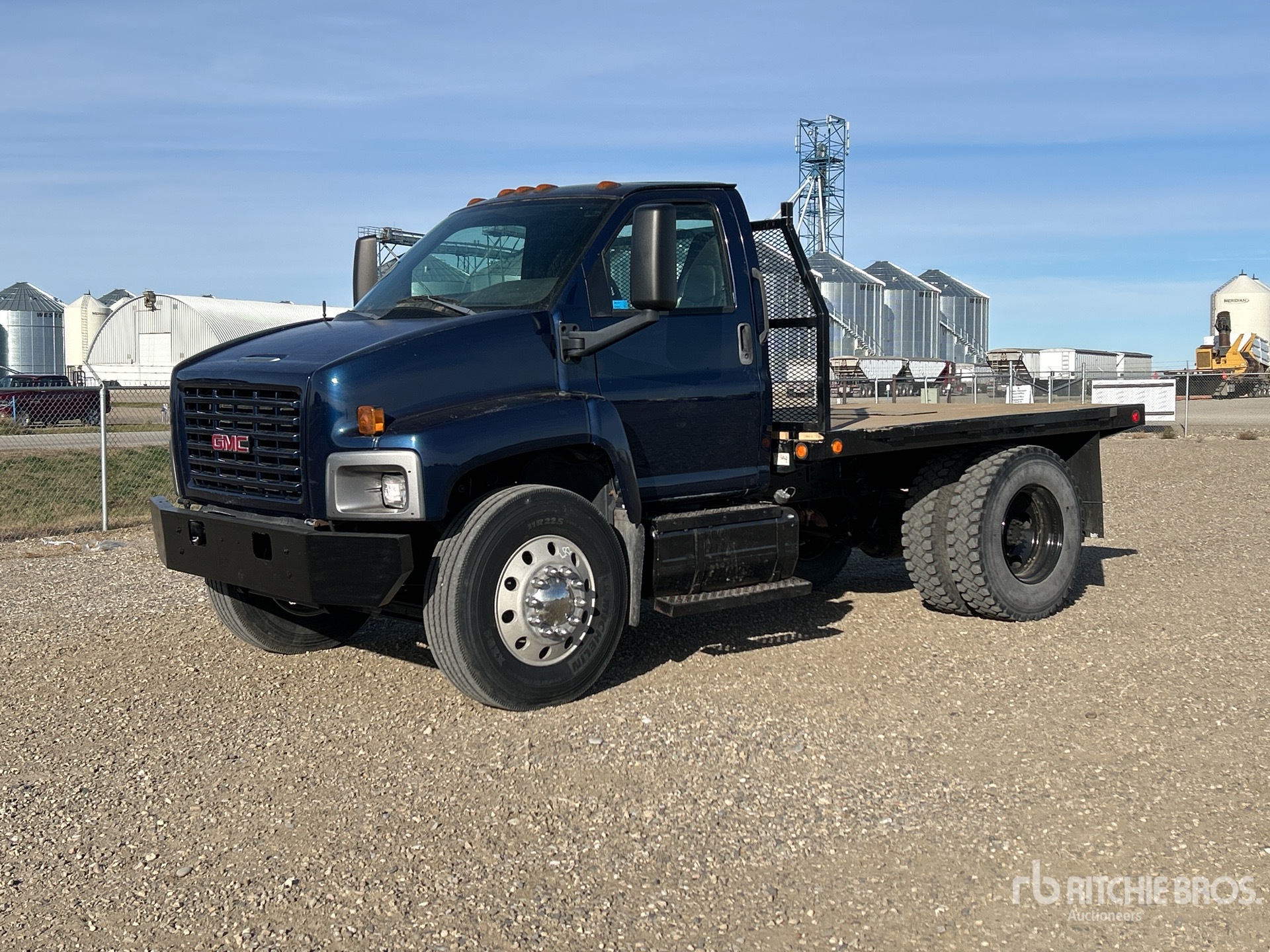 2004 GMC C6000 4x2 Flatbed Truck | Ritchie Bros. Auctioneers