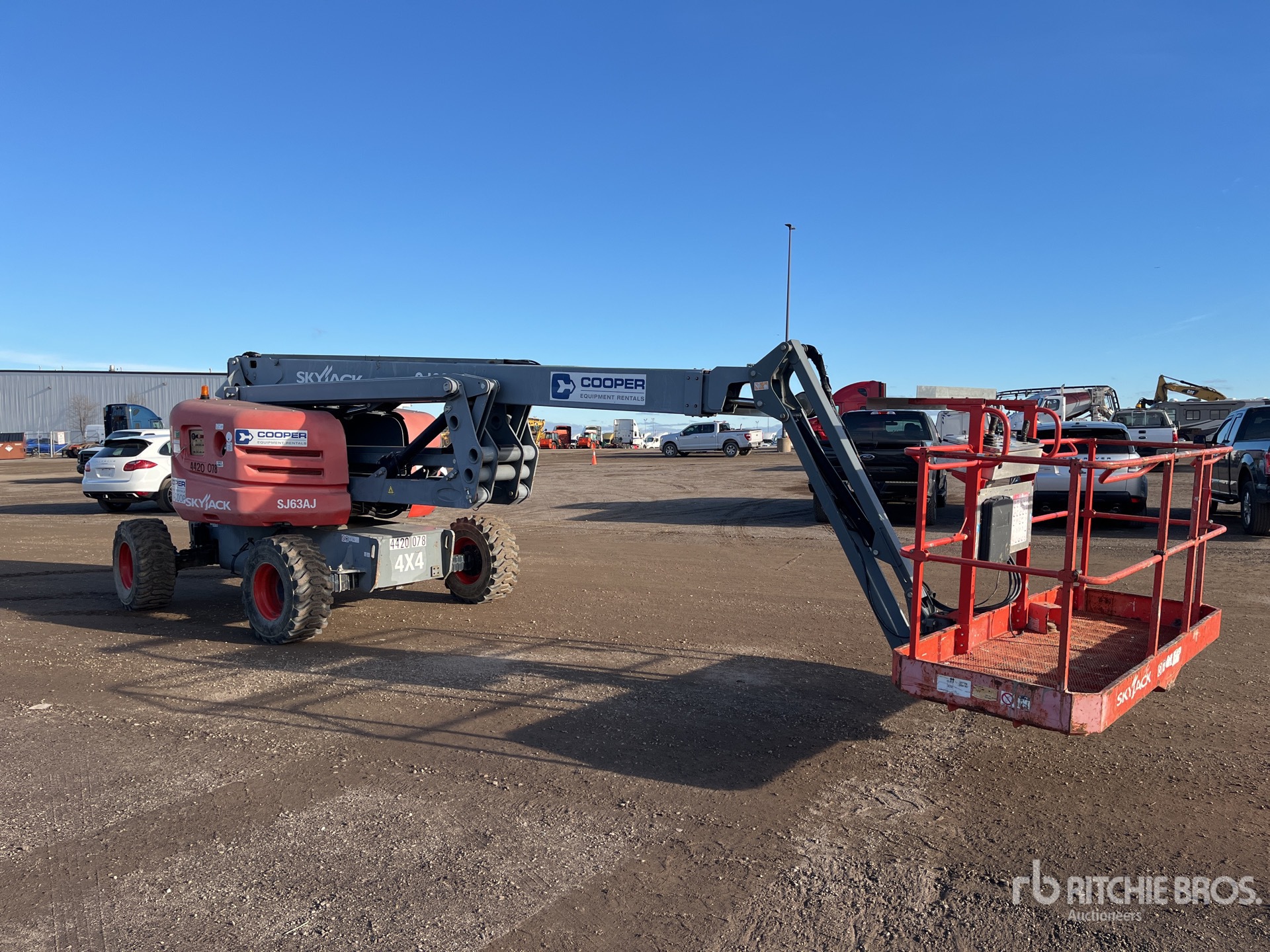 2015 Skyjack SJ63AJ 4WD Dual Fuel Articulating Boom Lift | Ritchie Bros ...