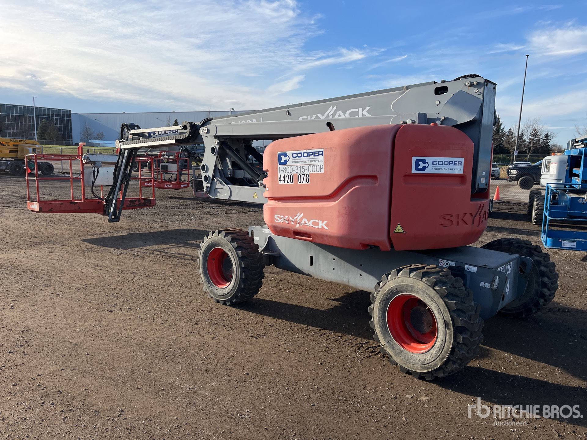 2015 Skyjack SJ63AJ 4WD Dual Fuel Articulating Boom Lift | Ritchie Bros ...