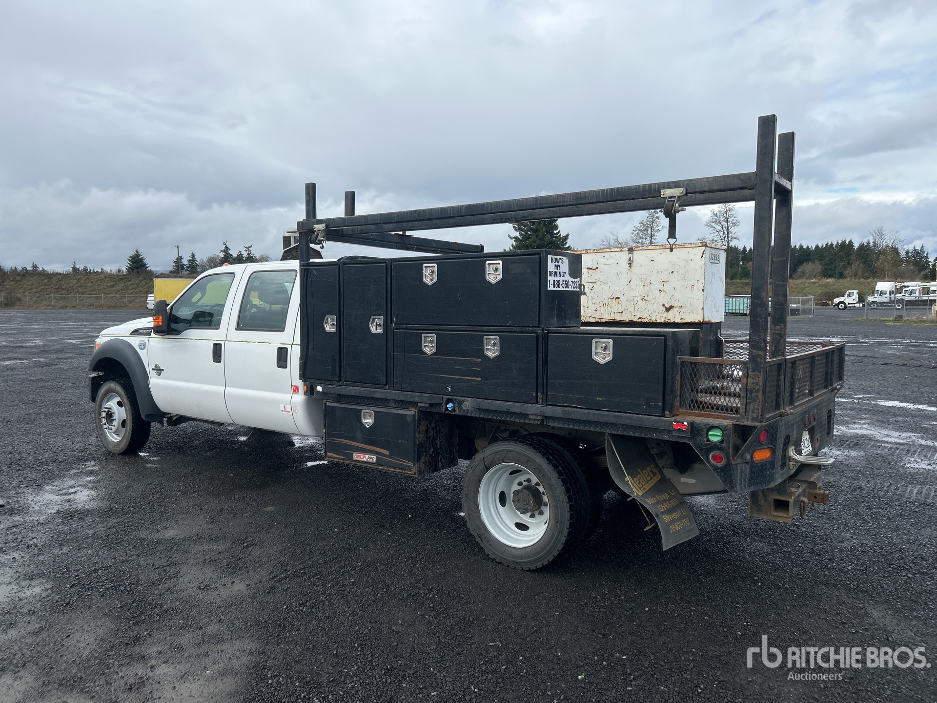 2015 Ford F-550 XL 4x4 Crew Cab Flatbed Truck | Ritchie Bros. Auctioneers