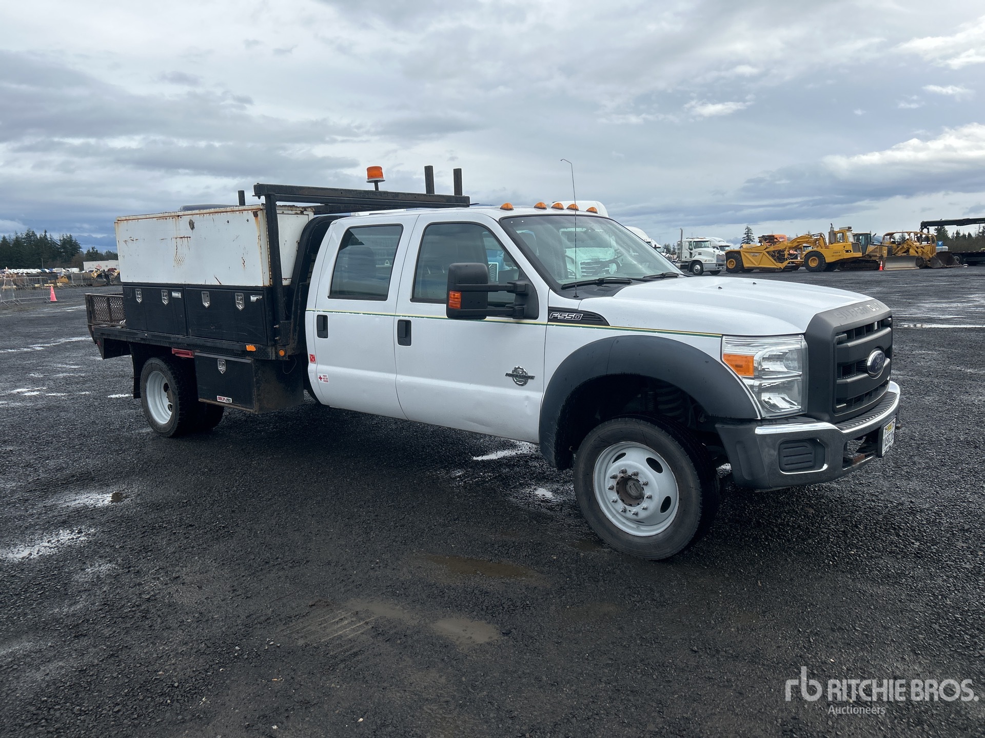 2015 Ford F-550 XL 4x4 Crew Cab Flatbed Truck | Ritchie Bros. Auctioneers