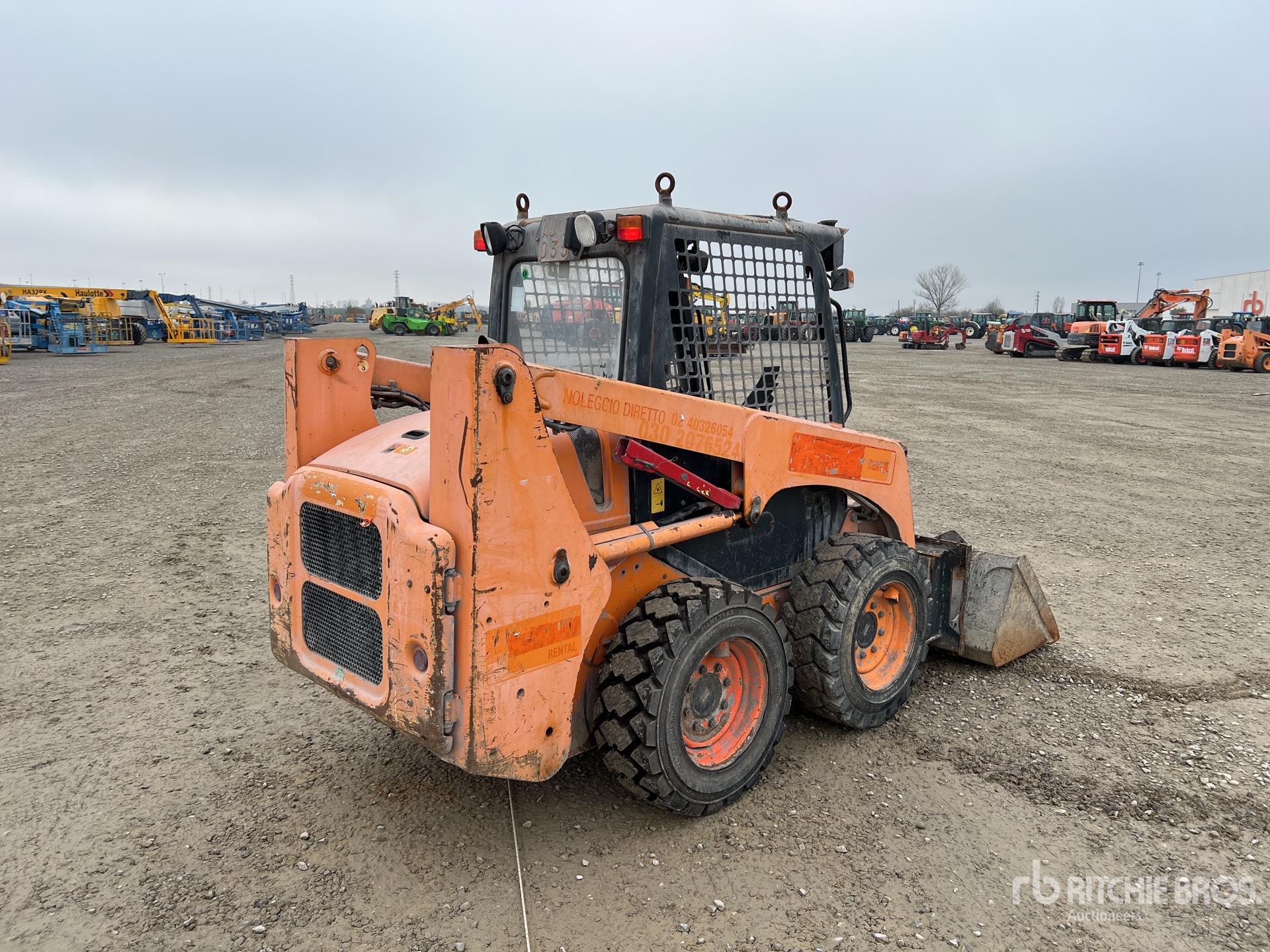 2012 Komatsu SK714-2 Skid Steer Loader | Ritchie Bros. Auctioneers
