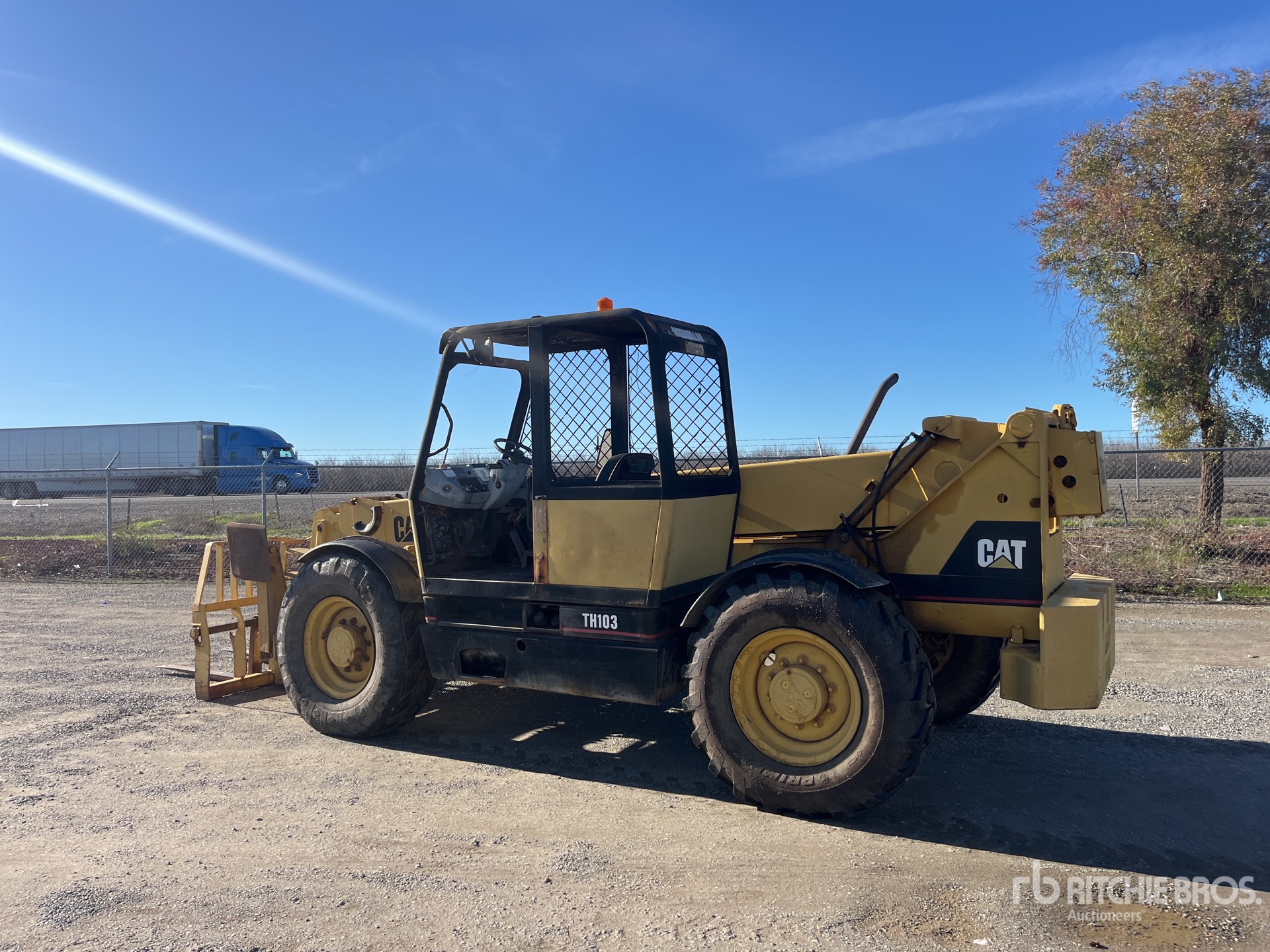 1997 Cat TH103 Telehandler | Ritchie Bros. Auctioneers