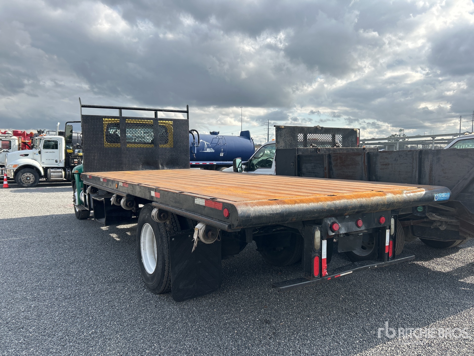 2012 International 4300 SBA 4x2 Flatbed Dump Truck | Ritchie Bros ...