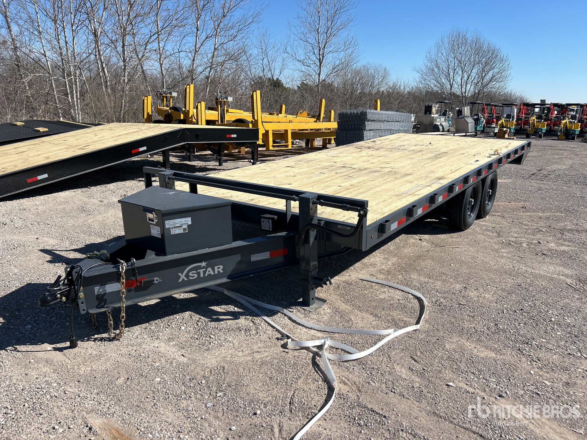2025 X-Star Trailers 20 ft T/A Flatbed Trailer | Ritchie Bros. Auctioneers