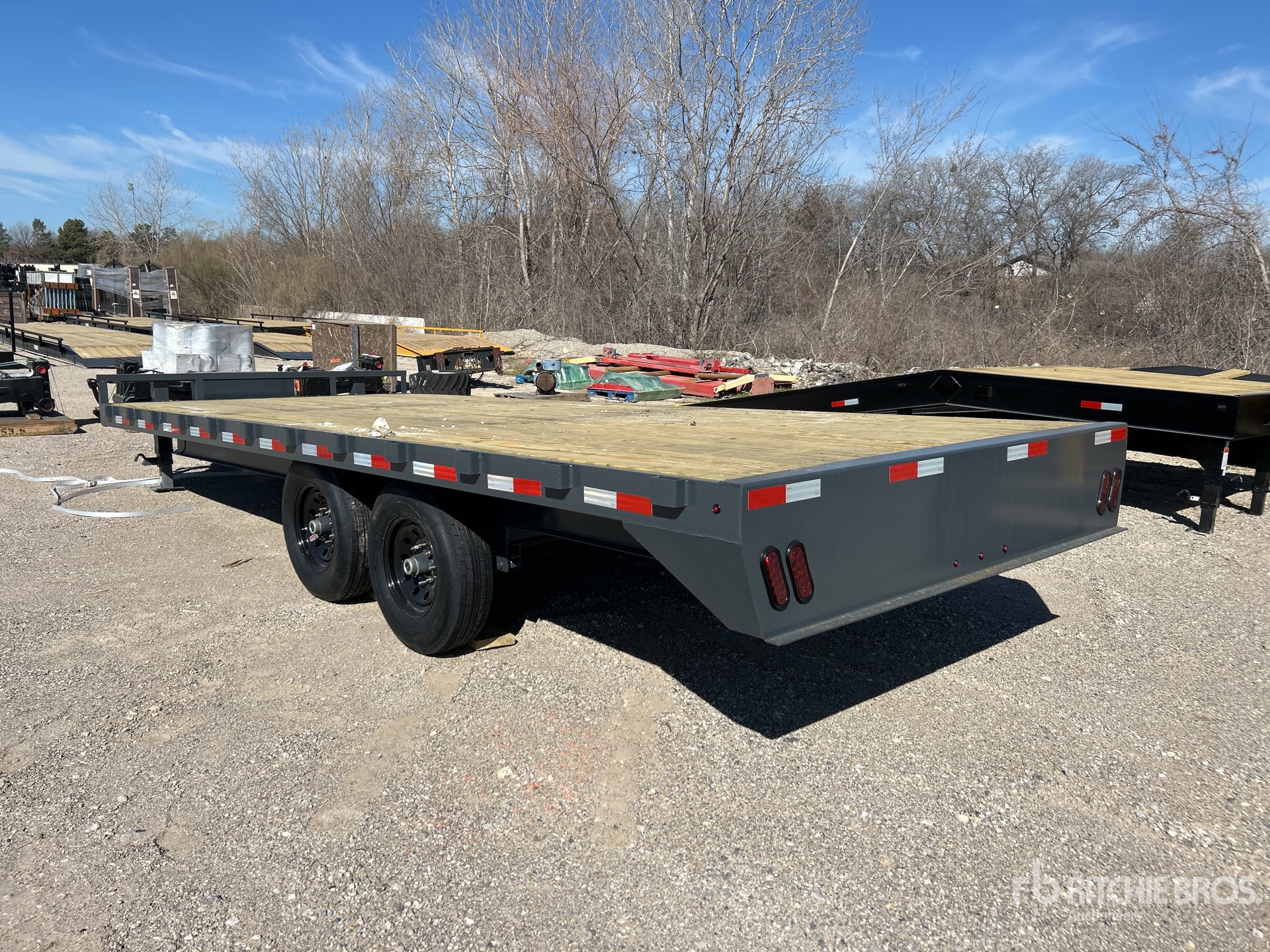 2025 X-Star Trailers 20 ft T/A Flatbed Trailer | Ritchie Bros. Auctioneers
