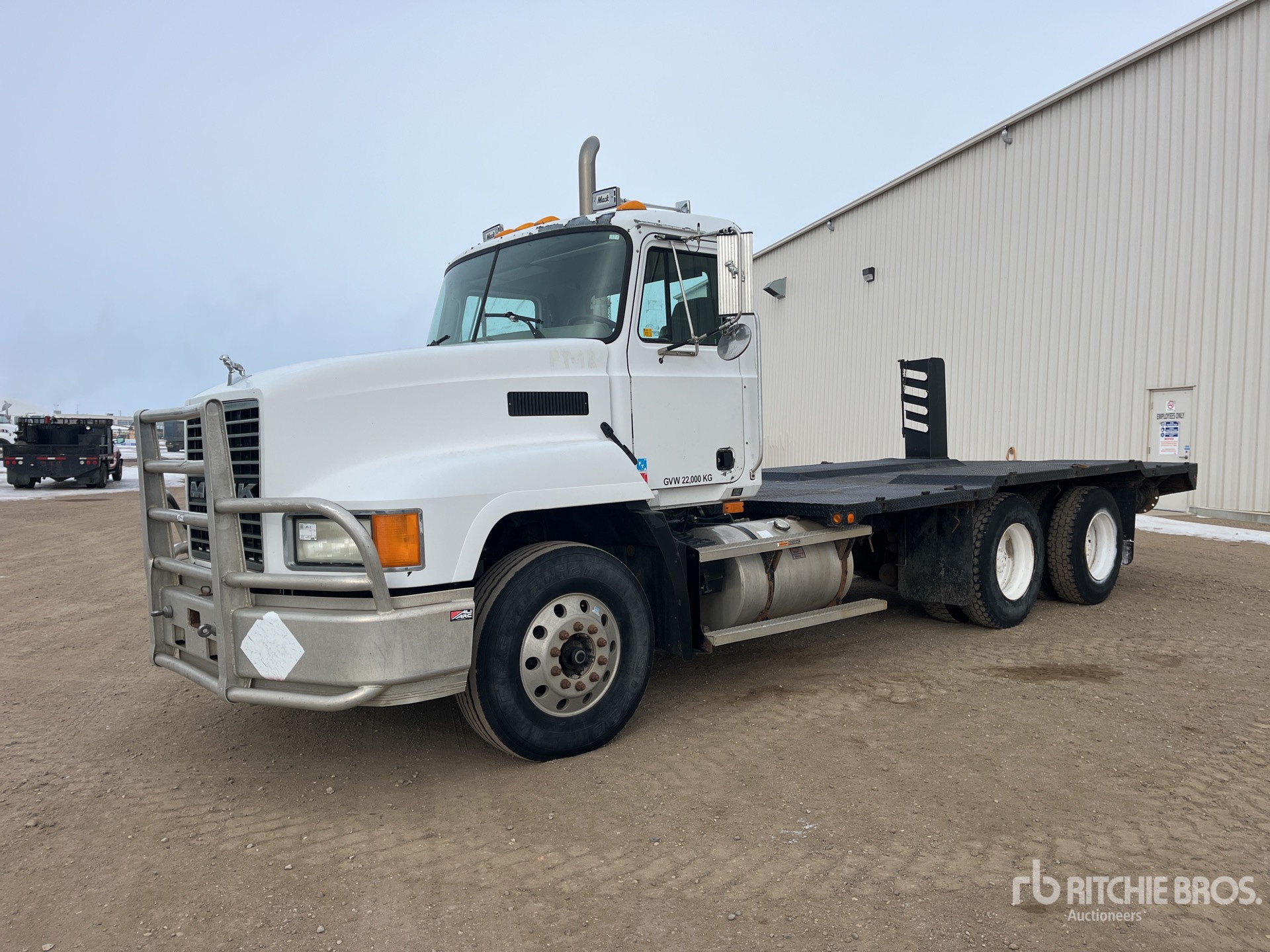 2001 Mack 600 6x4 Flatbed Truck | Ritchie Bros. Auctioneers
