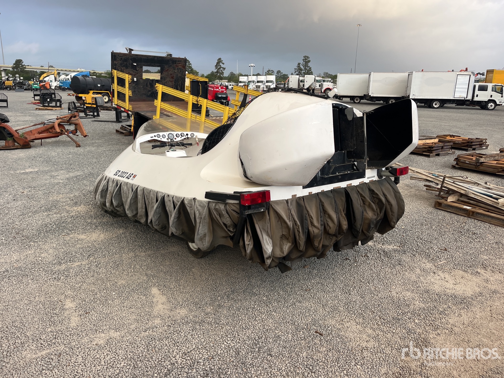 Neoteric Hovercraft Inc 16 ft Hovercraft w/ Neoteric Hovercraft Inc Trailer | Ritchie Bros ...