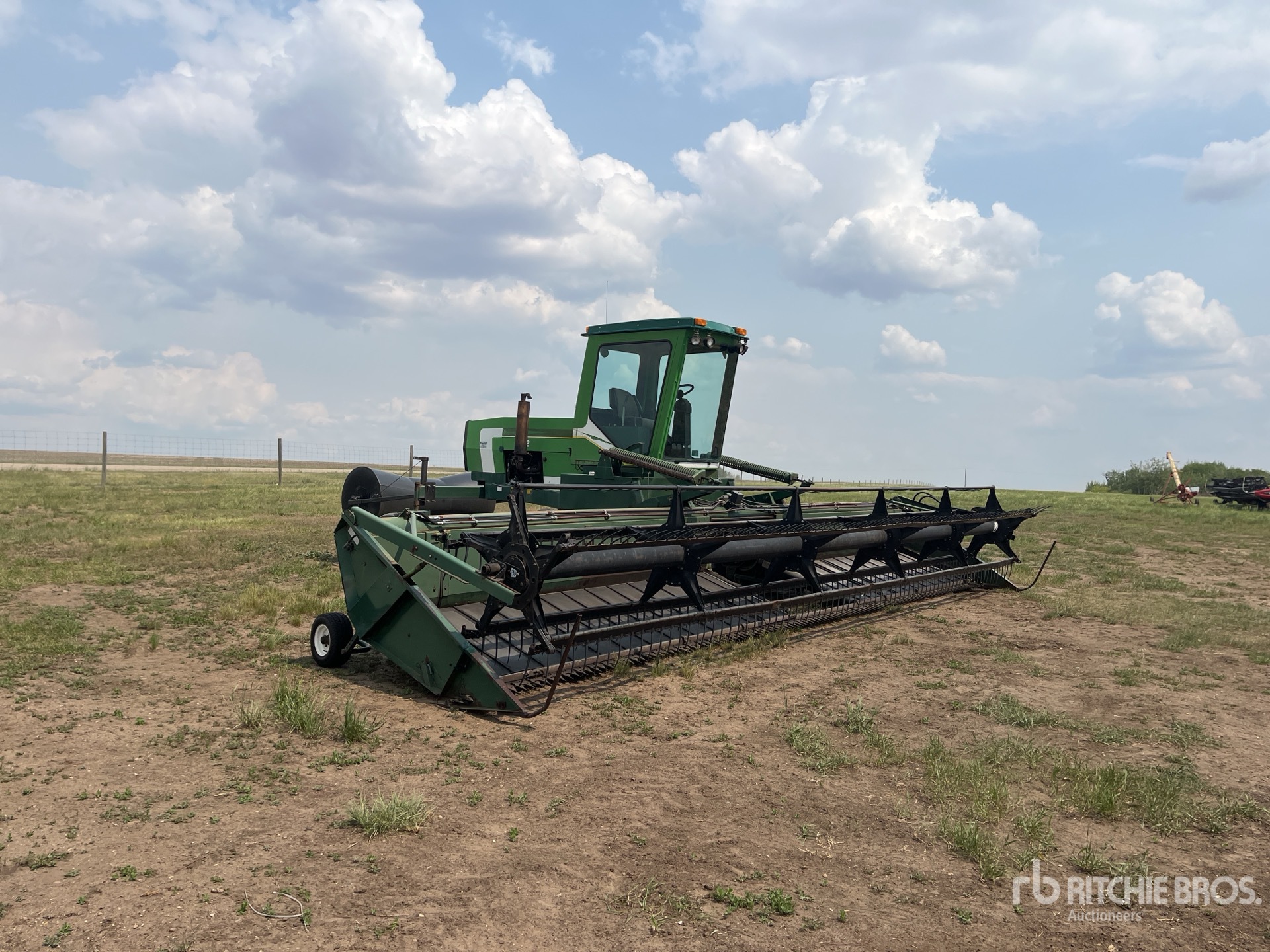 Cereal Implements 722 30 ft Swather Windrower | Ritchie Bros. Auctioneers